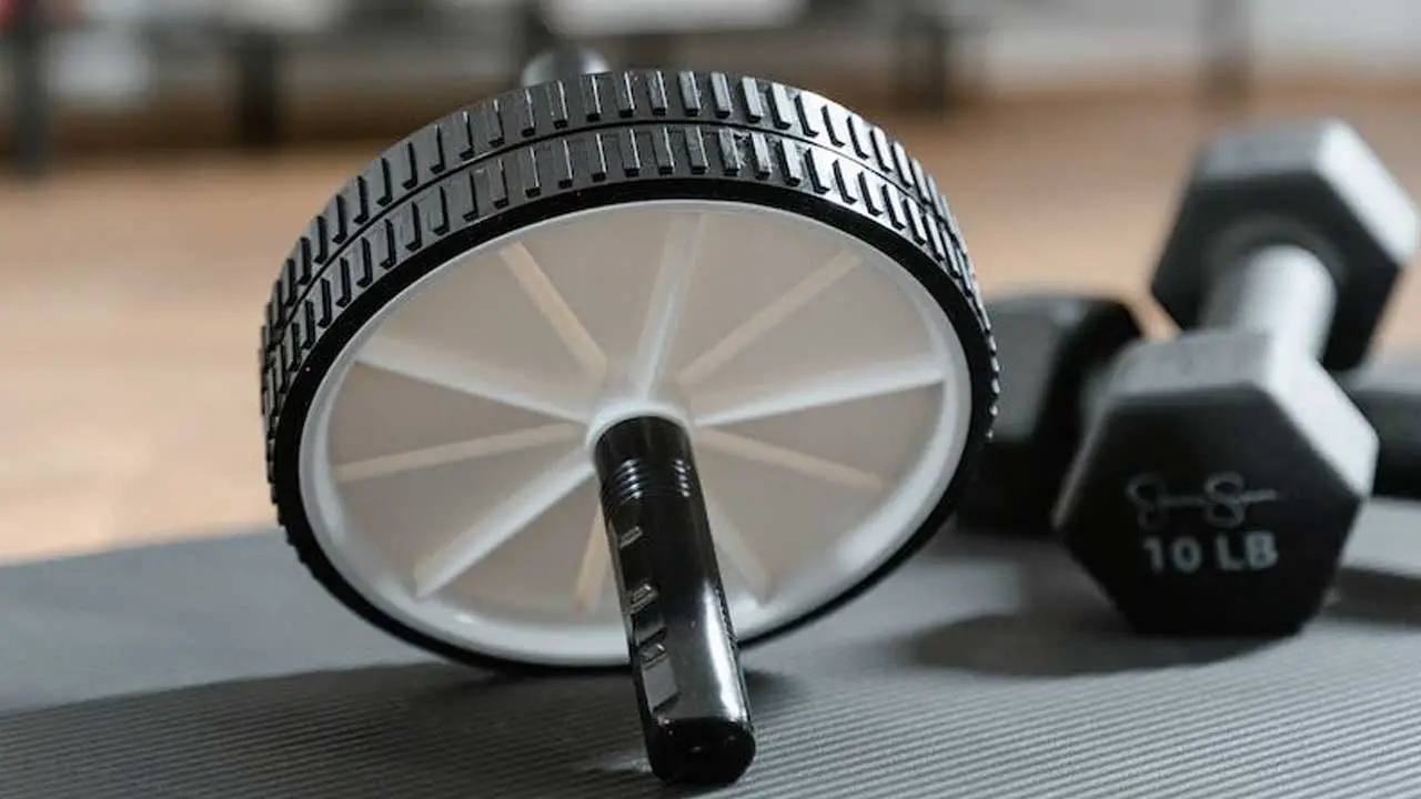 Benefits of Ab-Roller: Secrets to Building a Rock-Solid Core - ListedFit